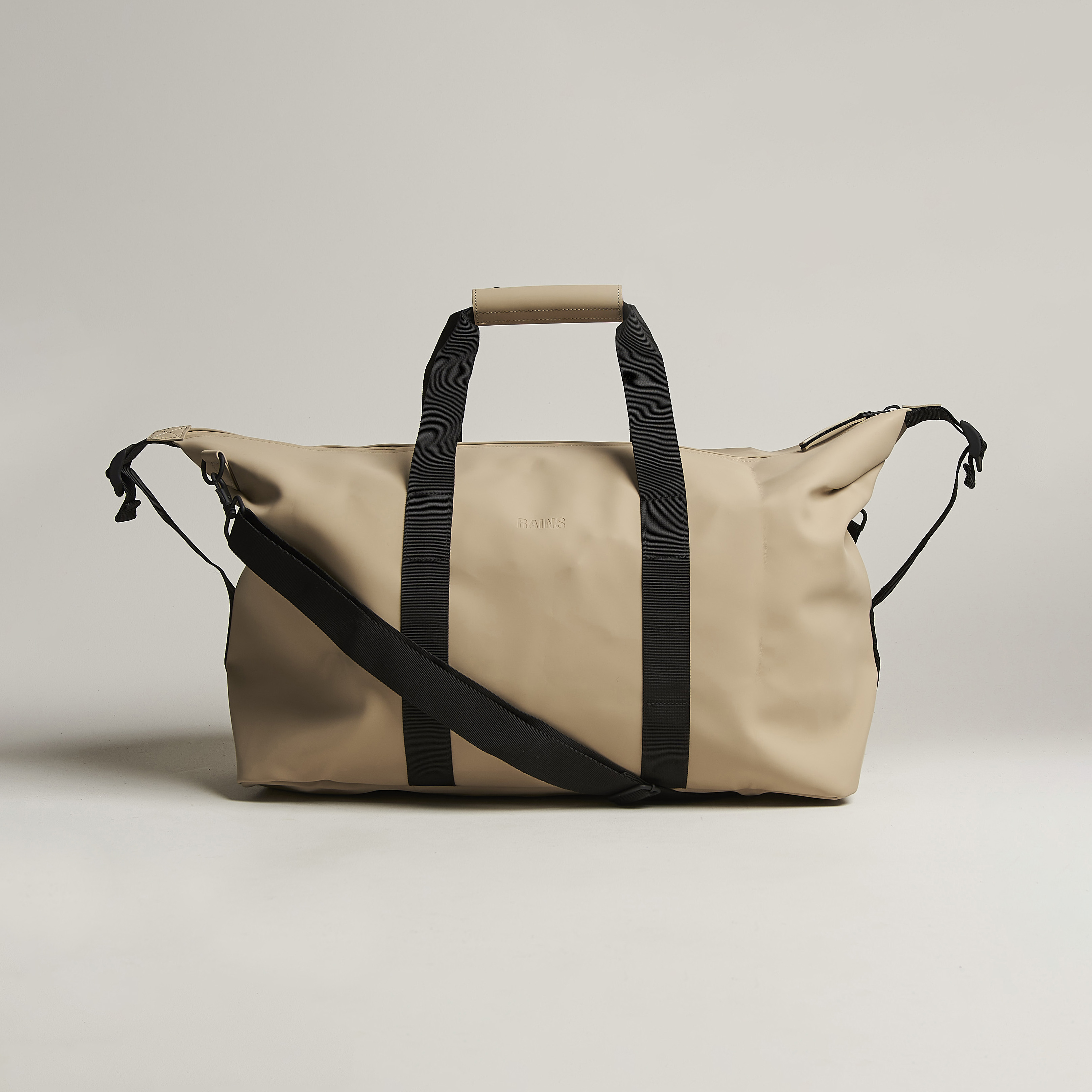 RAINS Weekendbag Sand | Herr - Care of Carl